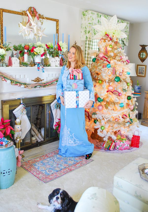 People Posing Next To Christmas Trees • PMQ for two